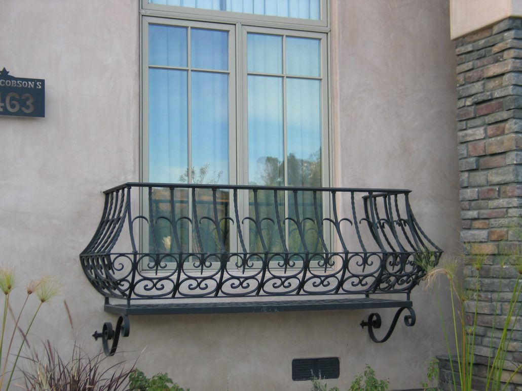 Vintage Style Home with Custom Metal Balcony Railings